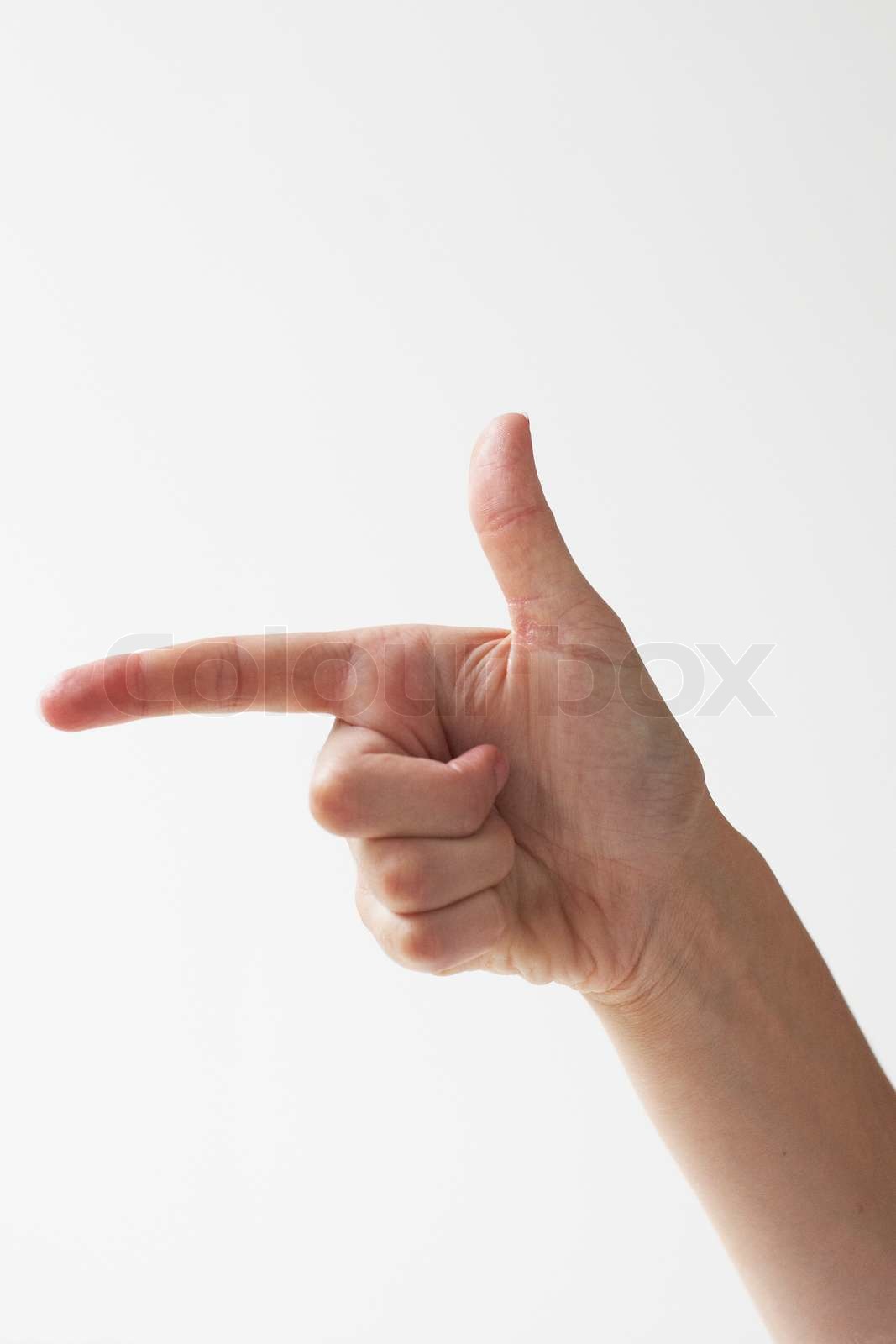 Hand gesturing sign language - shooting a gun | Stock image | Colourbox