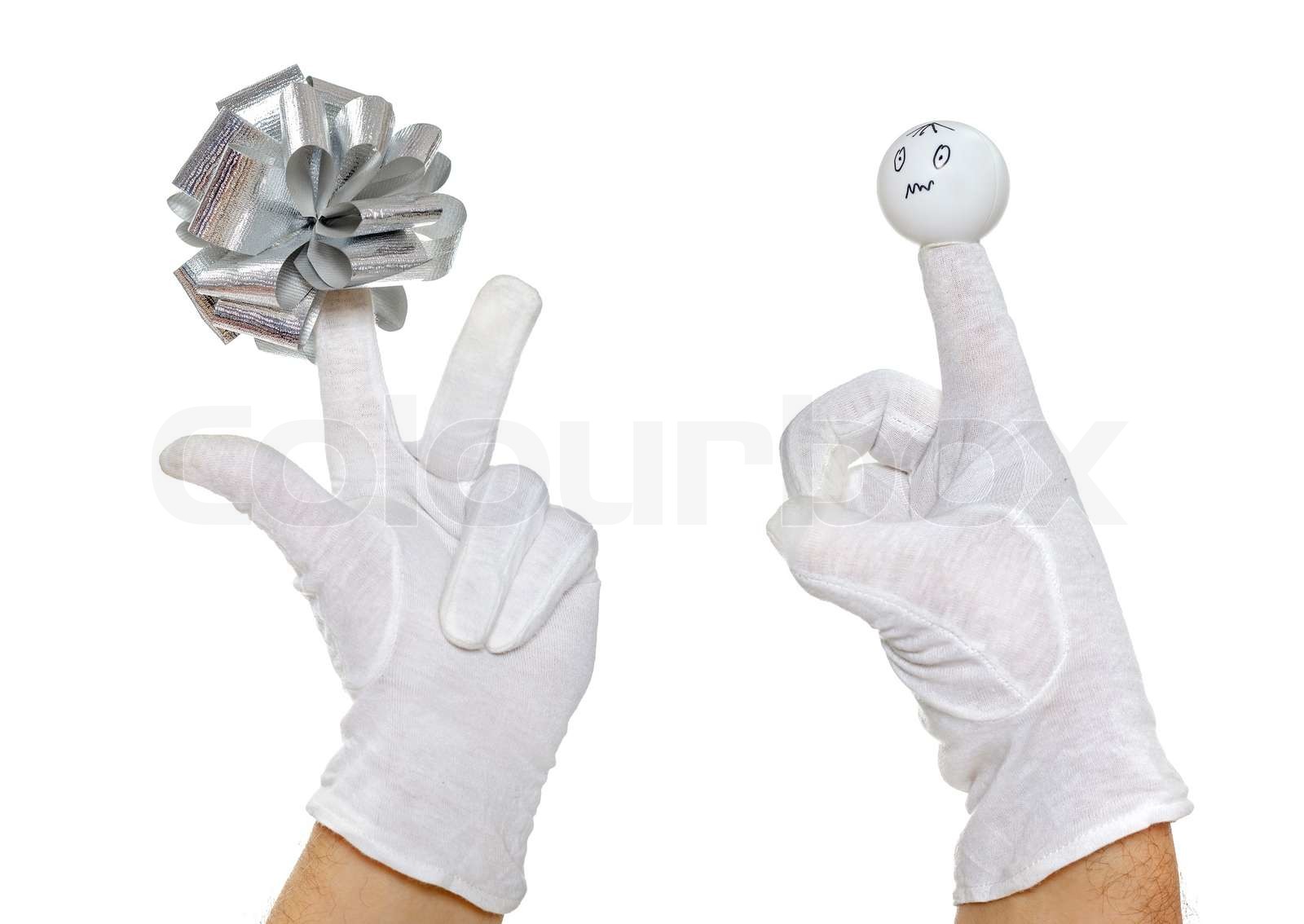 Finger puppet with confused face looking at other puppet with hairdo ...