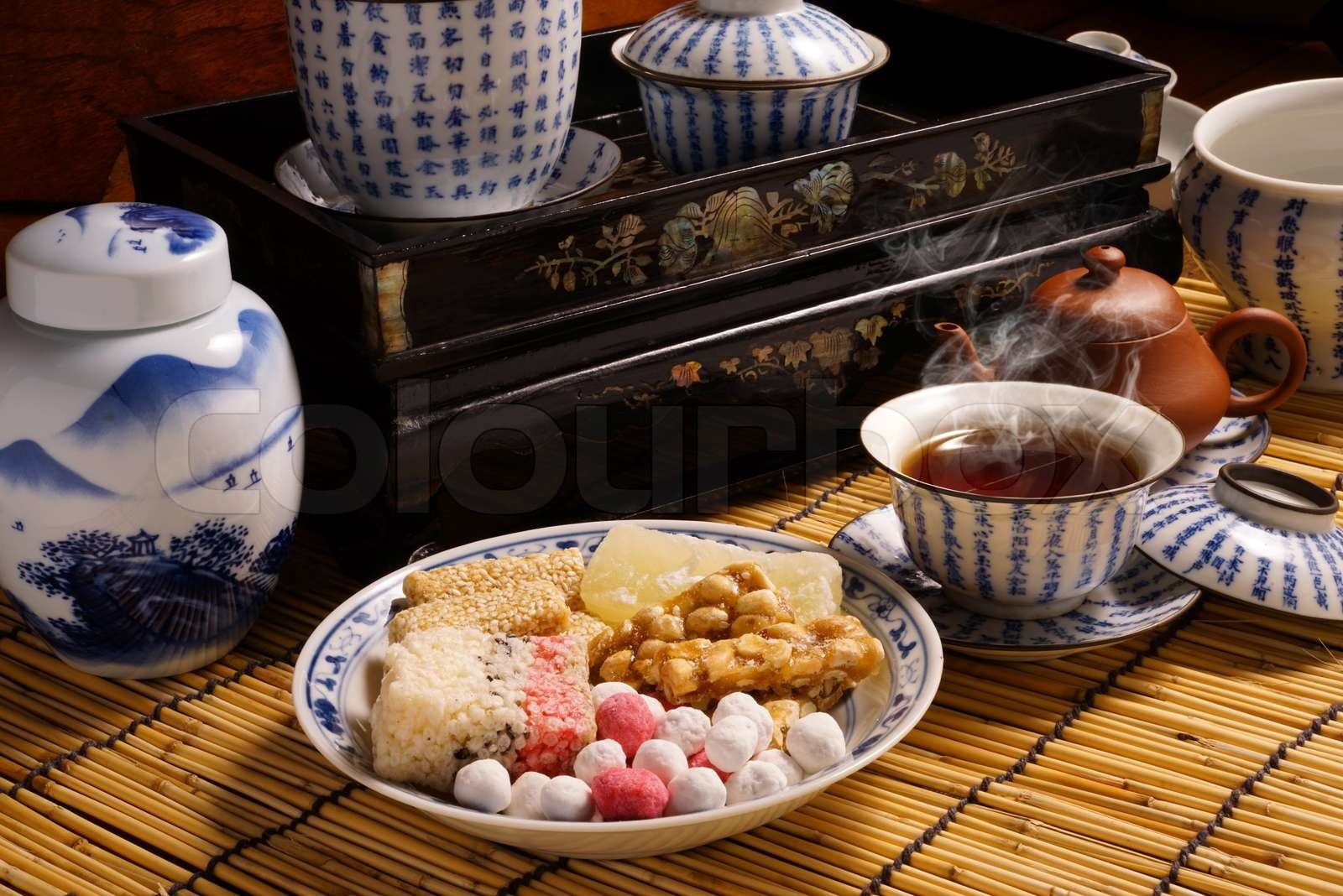 Chinese tea with traditional snack | Stock image | Colourbox