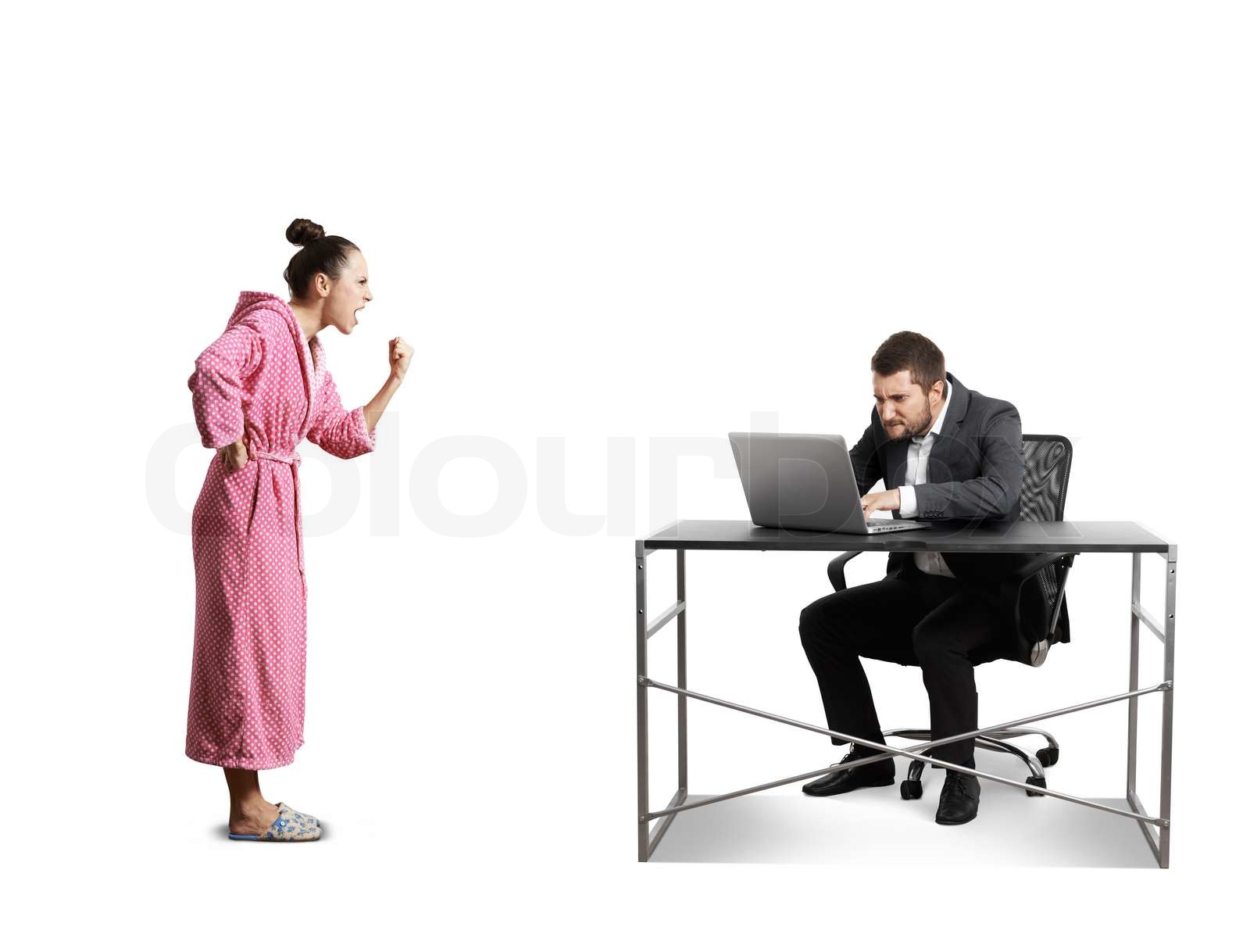 wife screaming at busy husband | Stock image | Colourbox