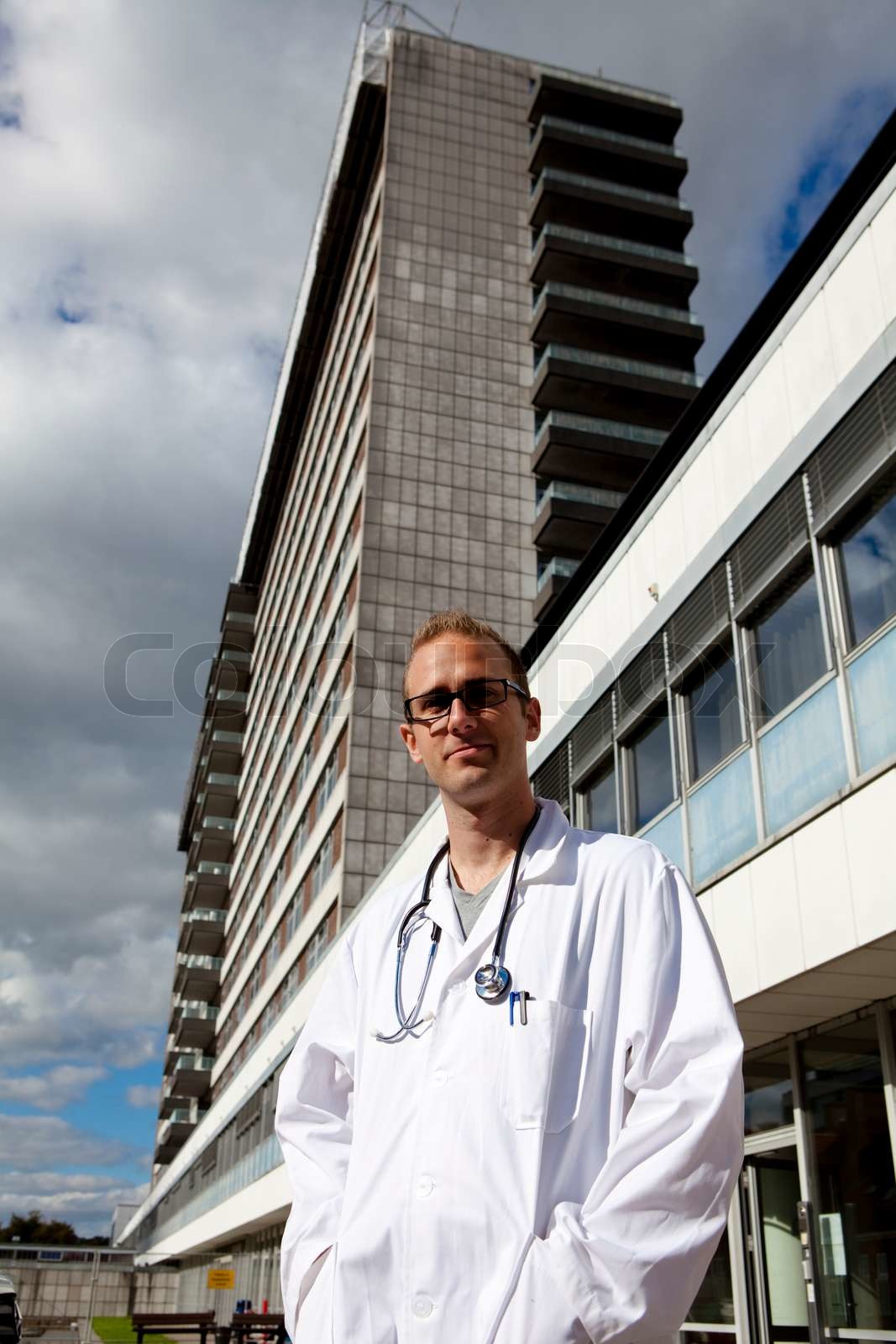 Doctor outside the hospital | Stock image | Colourbox