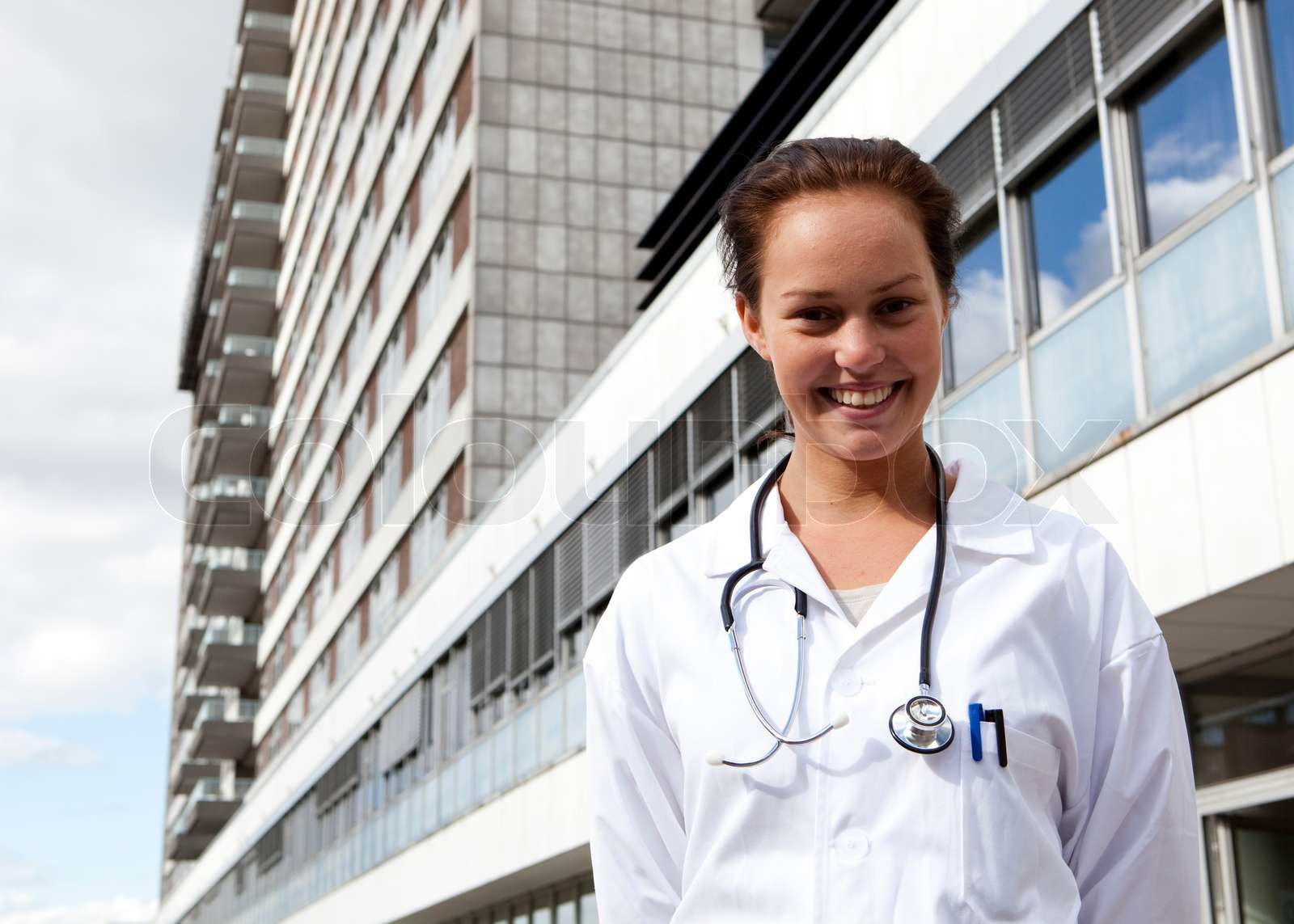 Doctor outside the hospital | Stock image | Colourbox