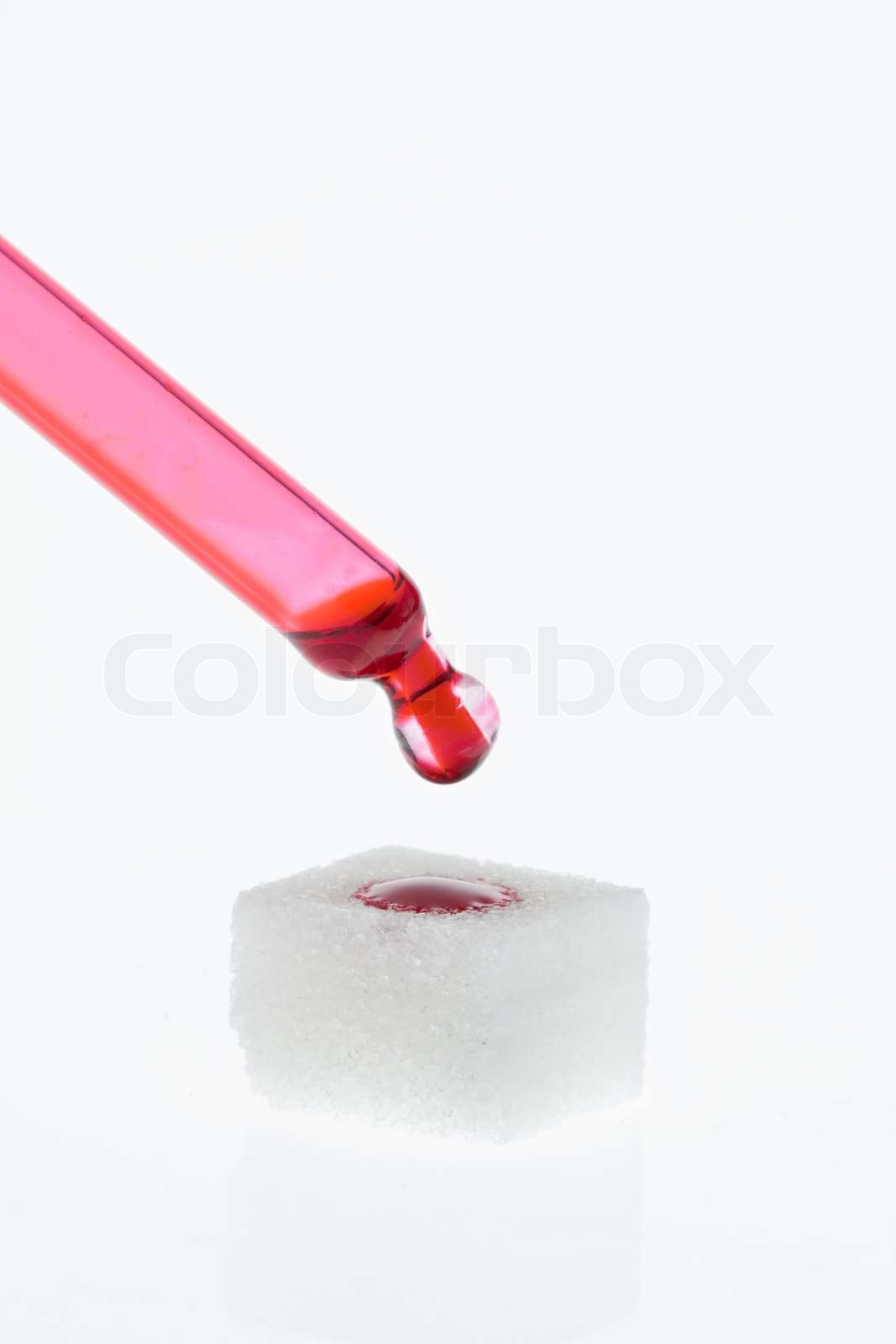 Polio vaccine. Symbol of vaccine on a sugar cube | Stock image | Colourbox