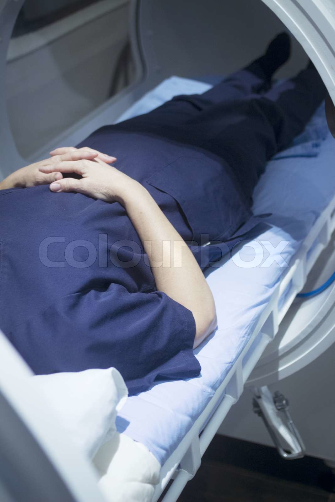 Female patient in oxygen hyperbaric chamber HBOT | Stock image | Colourbox