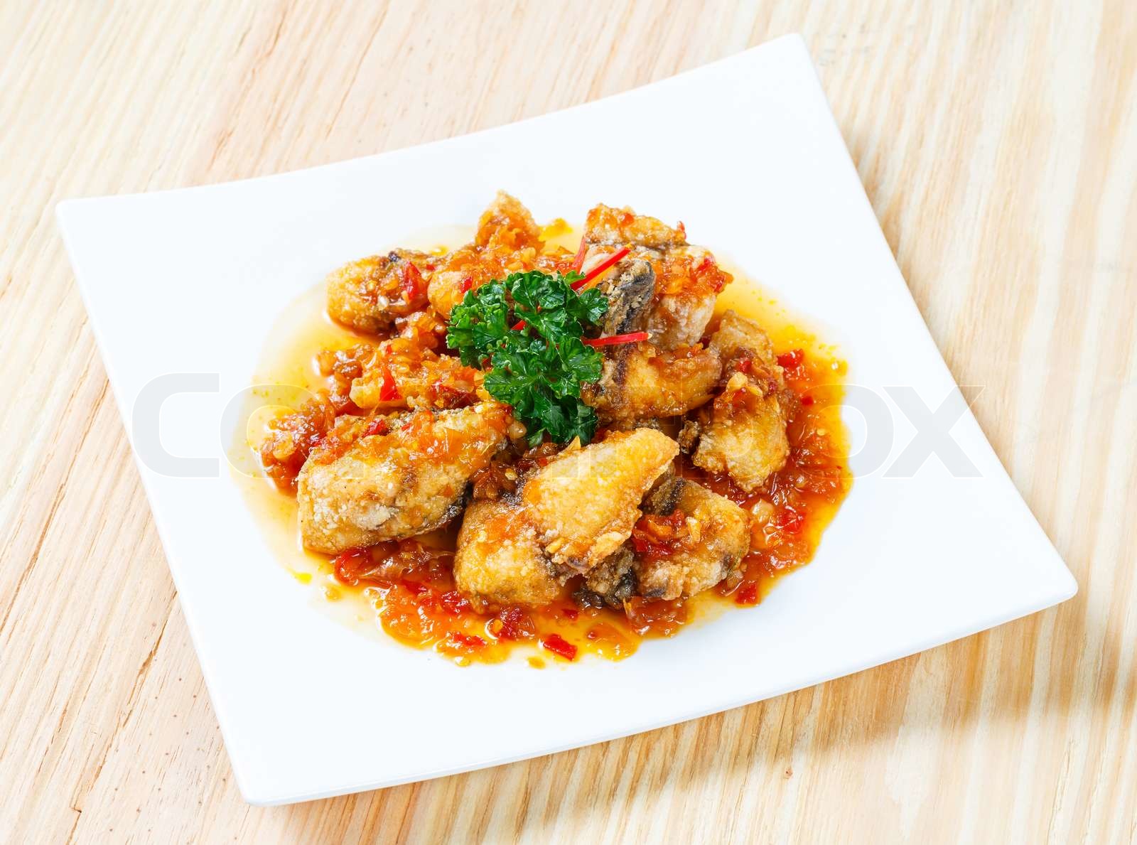 Deep fried grouper fish spicy sweet and sour sauce | Stock image ...