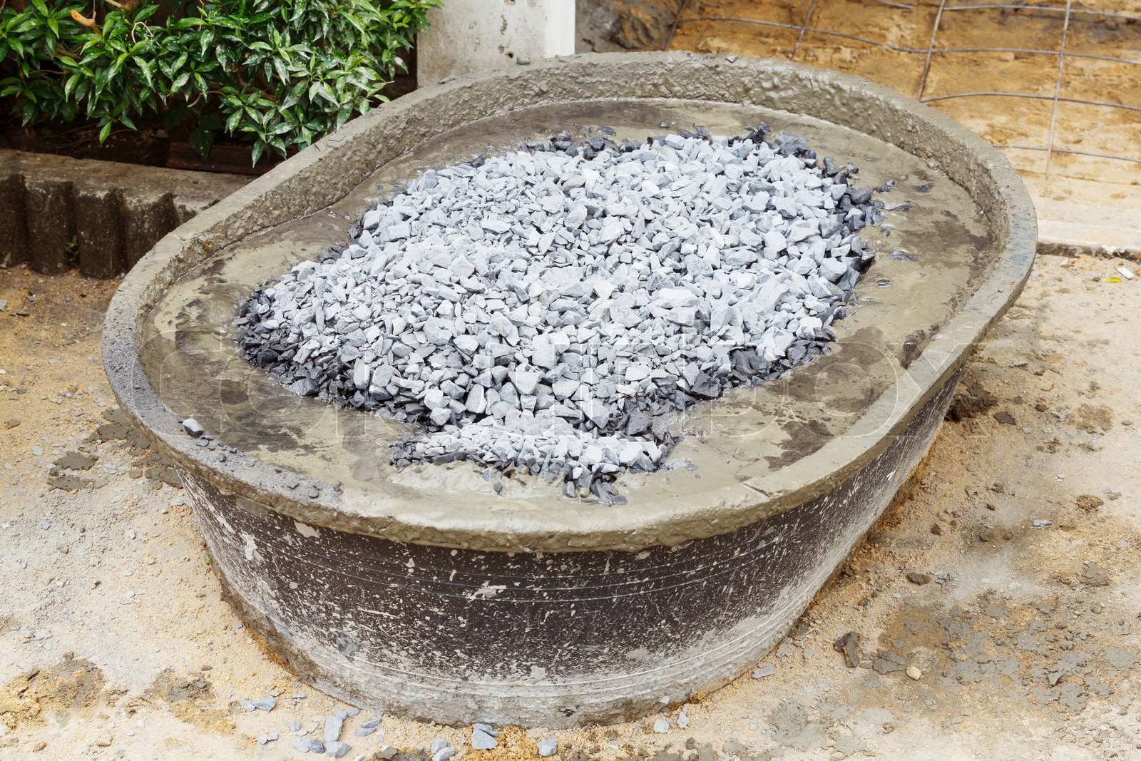 Cement mixing tub | Stock image | Colourbox