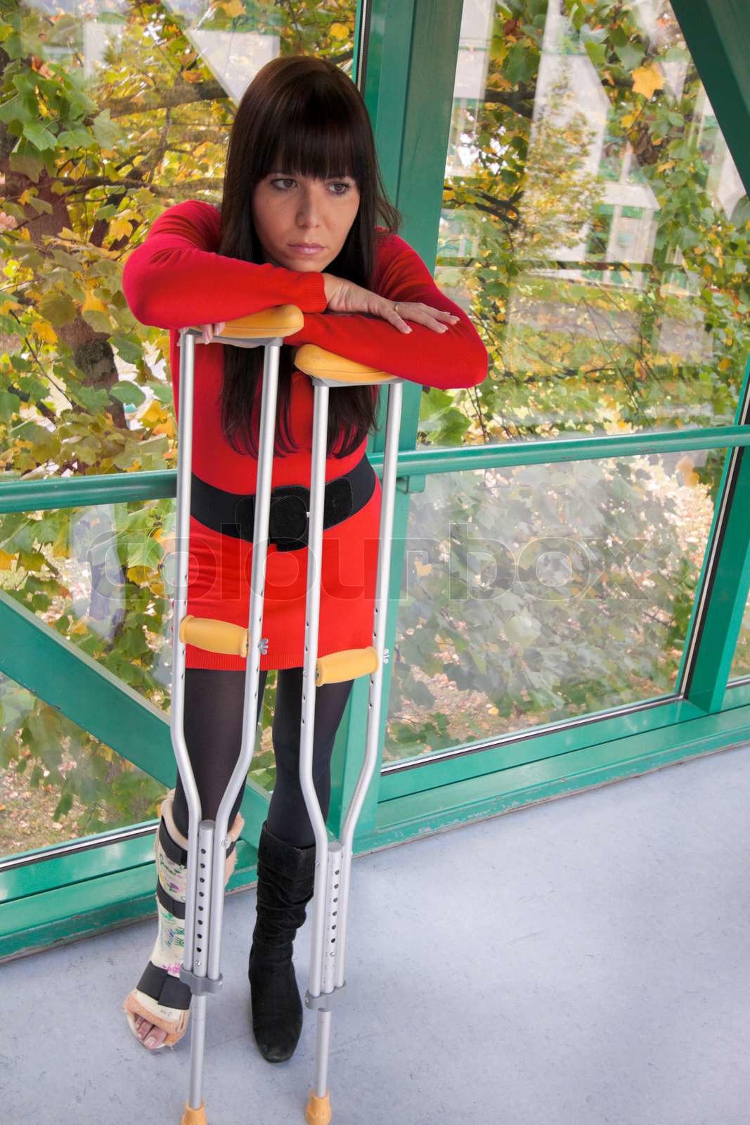 Young woman with a leg cast and crutches in hospital | Stock image ...