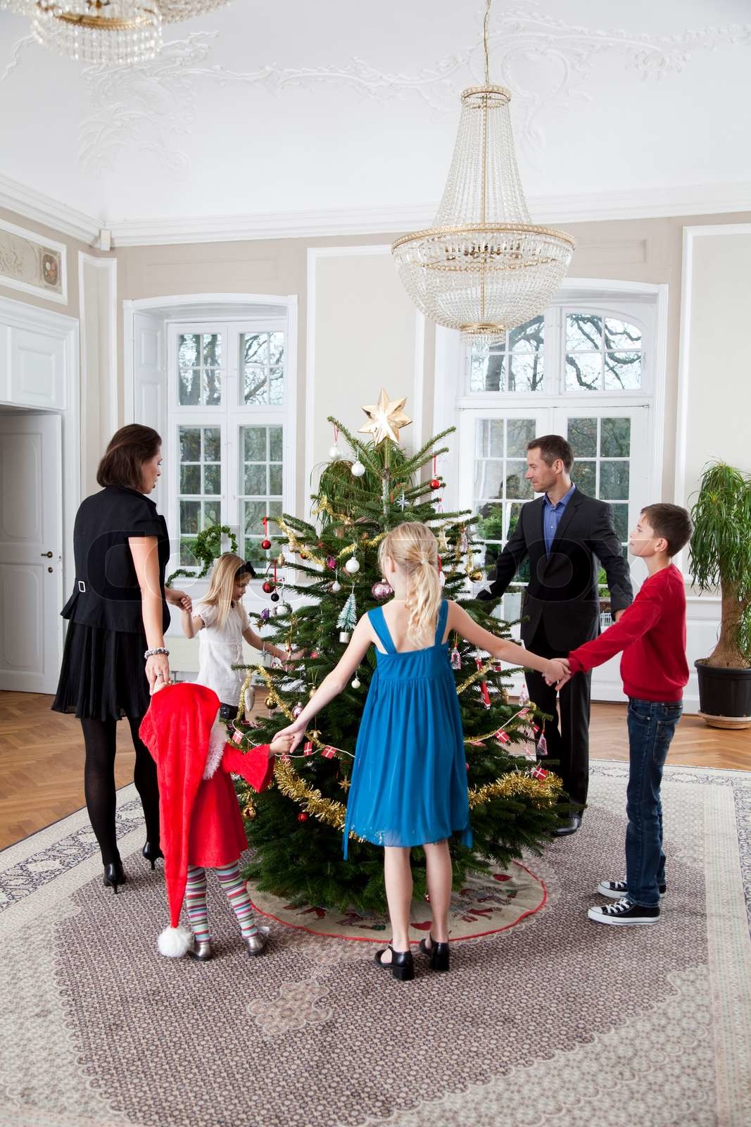 Dancing around the Christmas tree | Stock image | Colourbox