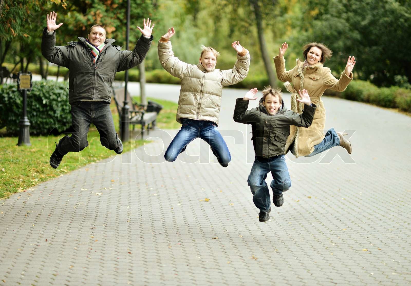 Happy family jumping | Stock image | Colourbox