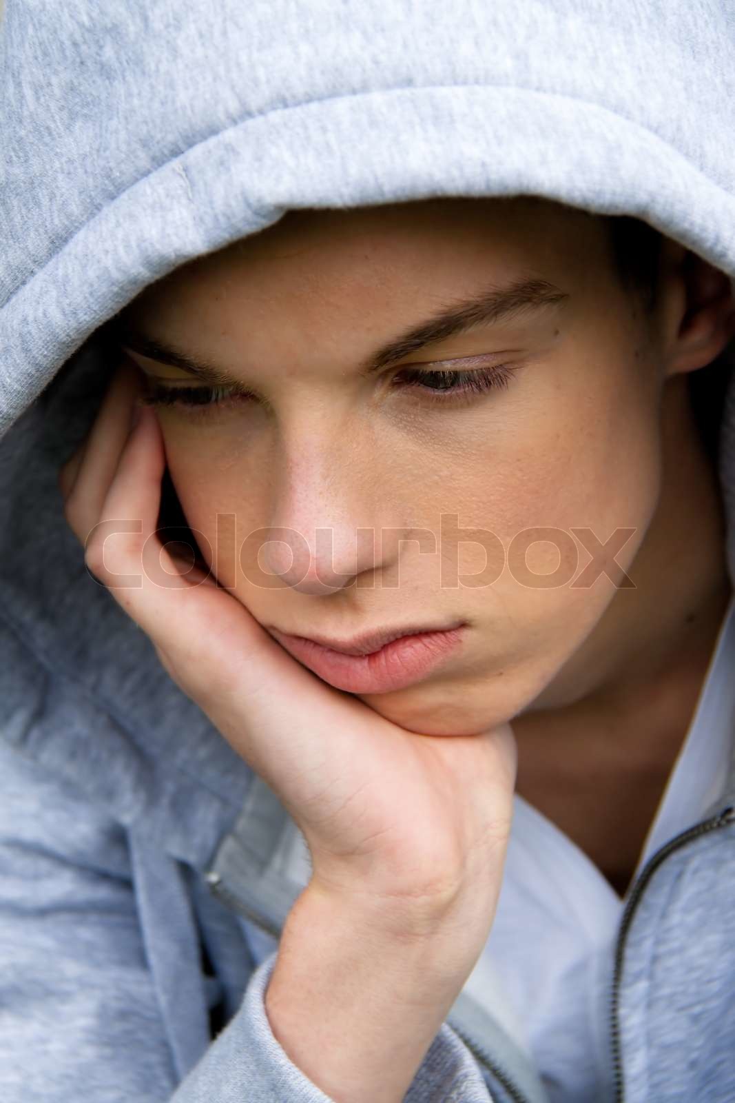 A young man is bored | Stock image | Colourbox
