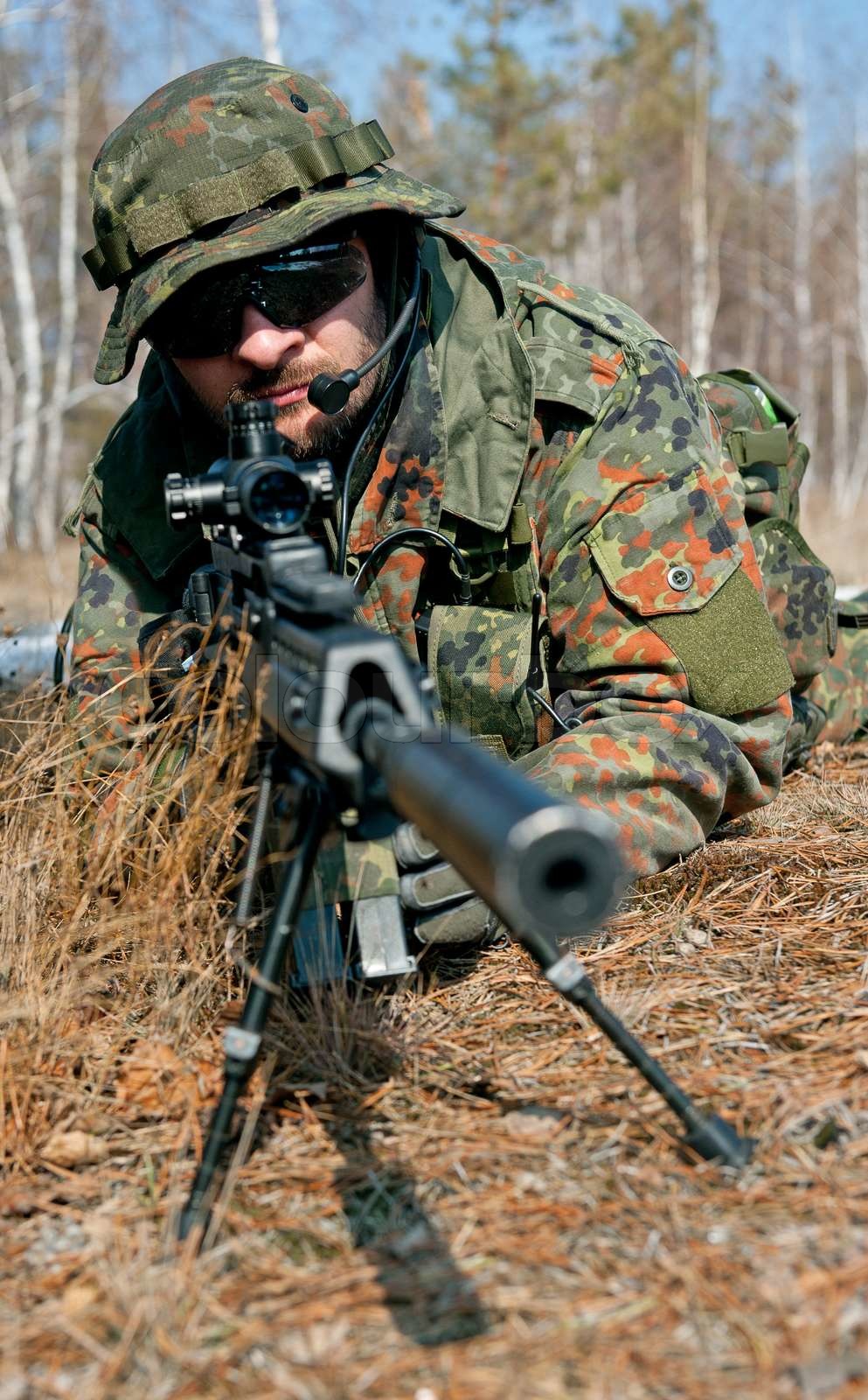 Masked sniper is aiming at the target during the mission | Stock image ...