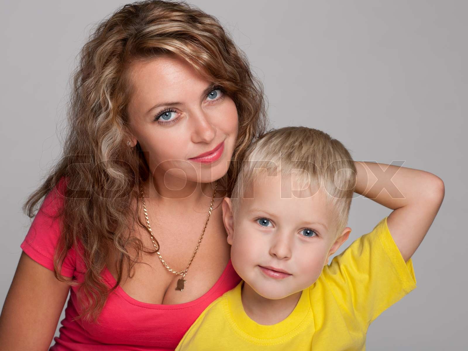 Happy little blond boy and his mother | Stock image | Colourbox