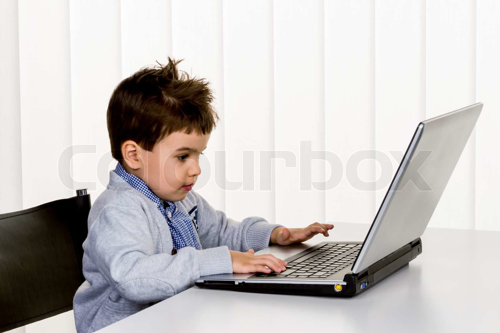little boy at computer | Stock image | Colourbox