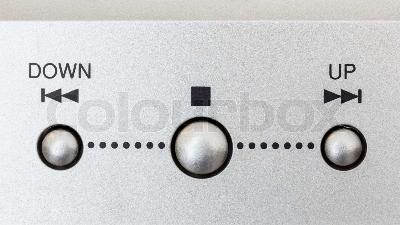 Close up control button on CD player | Stock image | Colourbox