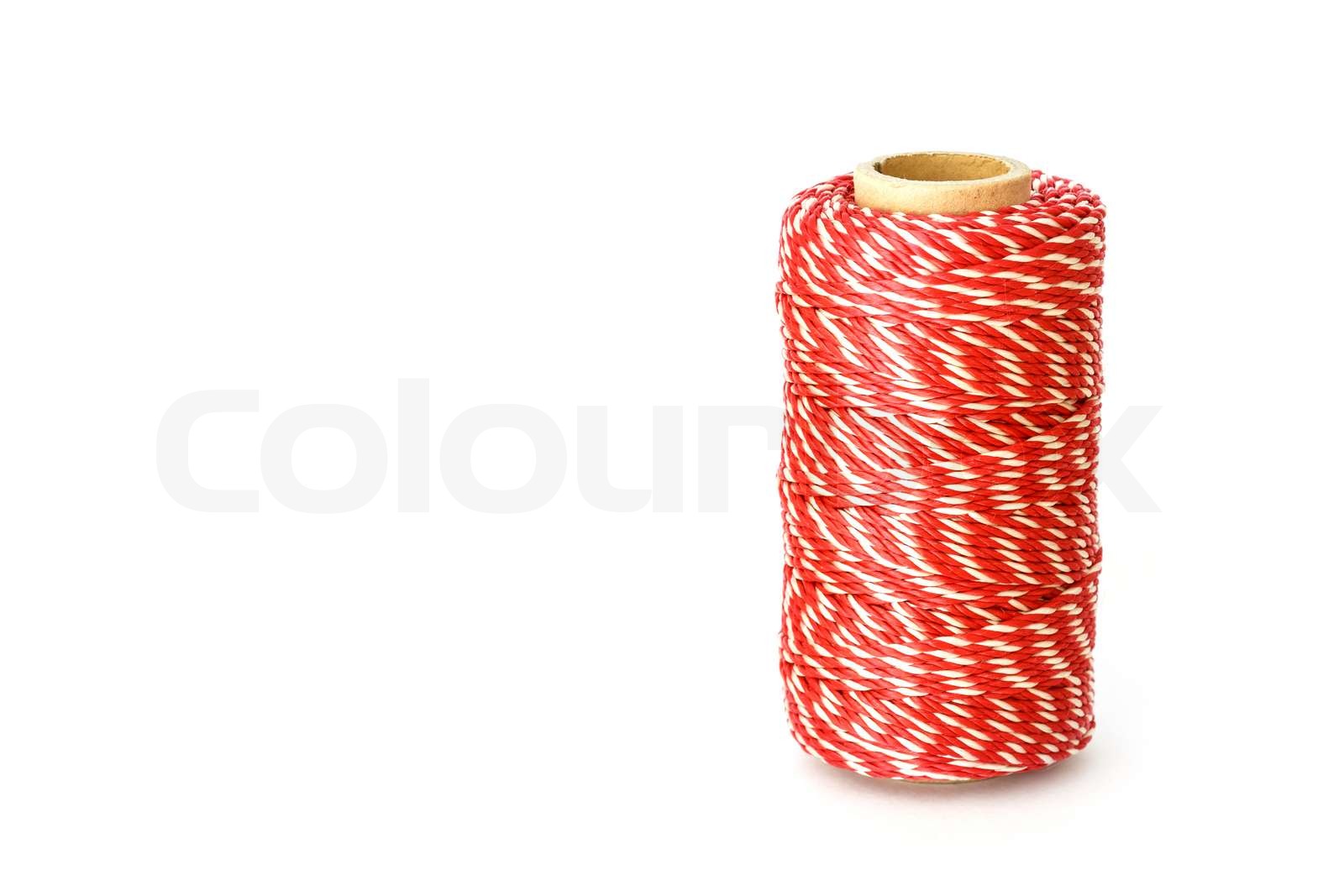 Close up roll of red rope | Stock image | Colourbox