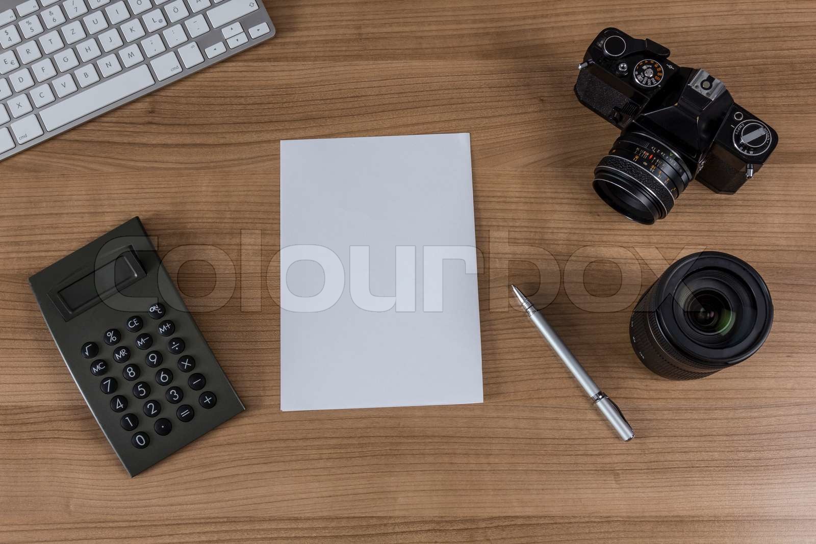 desktop with camera keyboard and calculator | Stock image | Colourbox