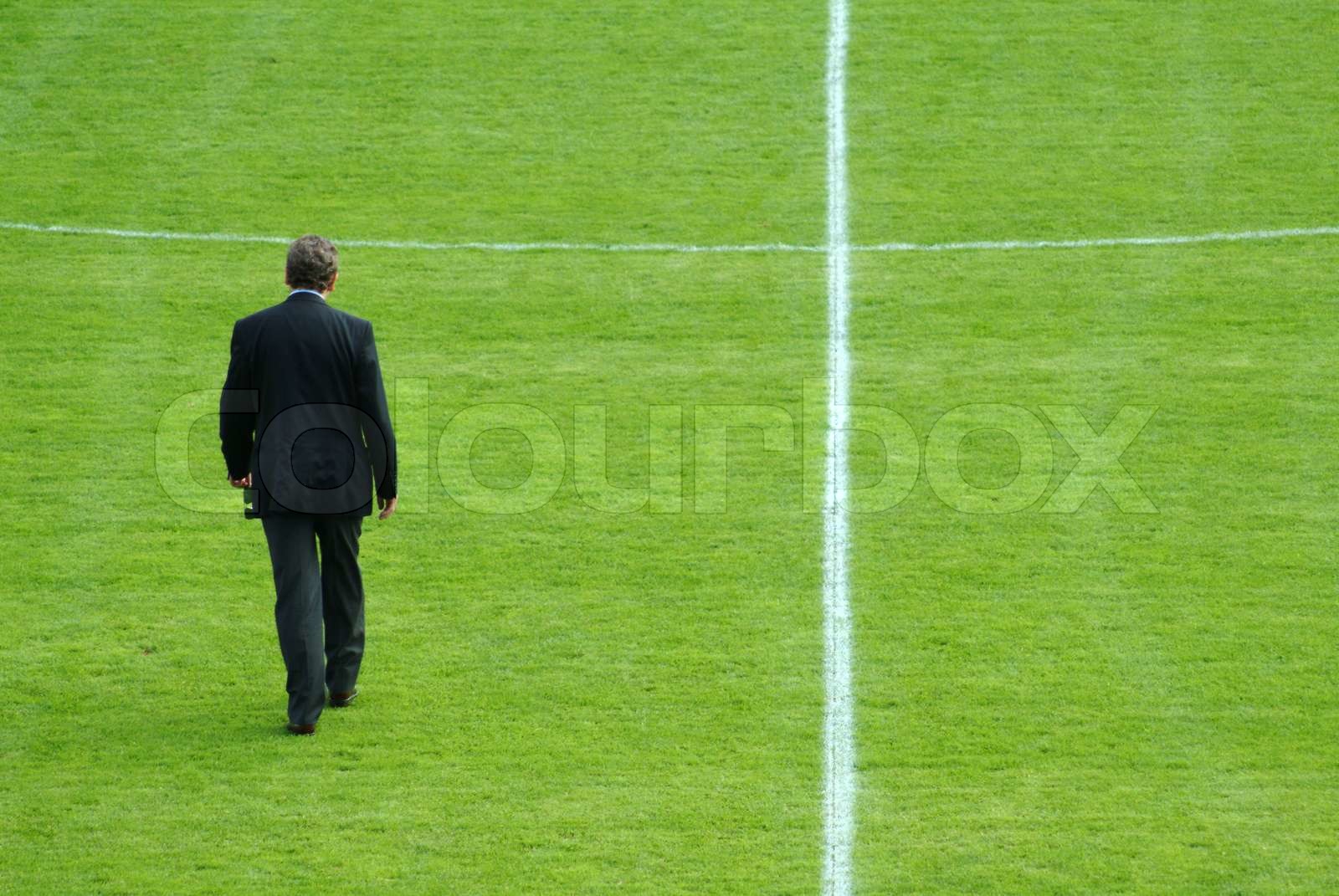 Man on the football ground | Stock image | Colourbox
