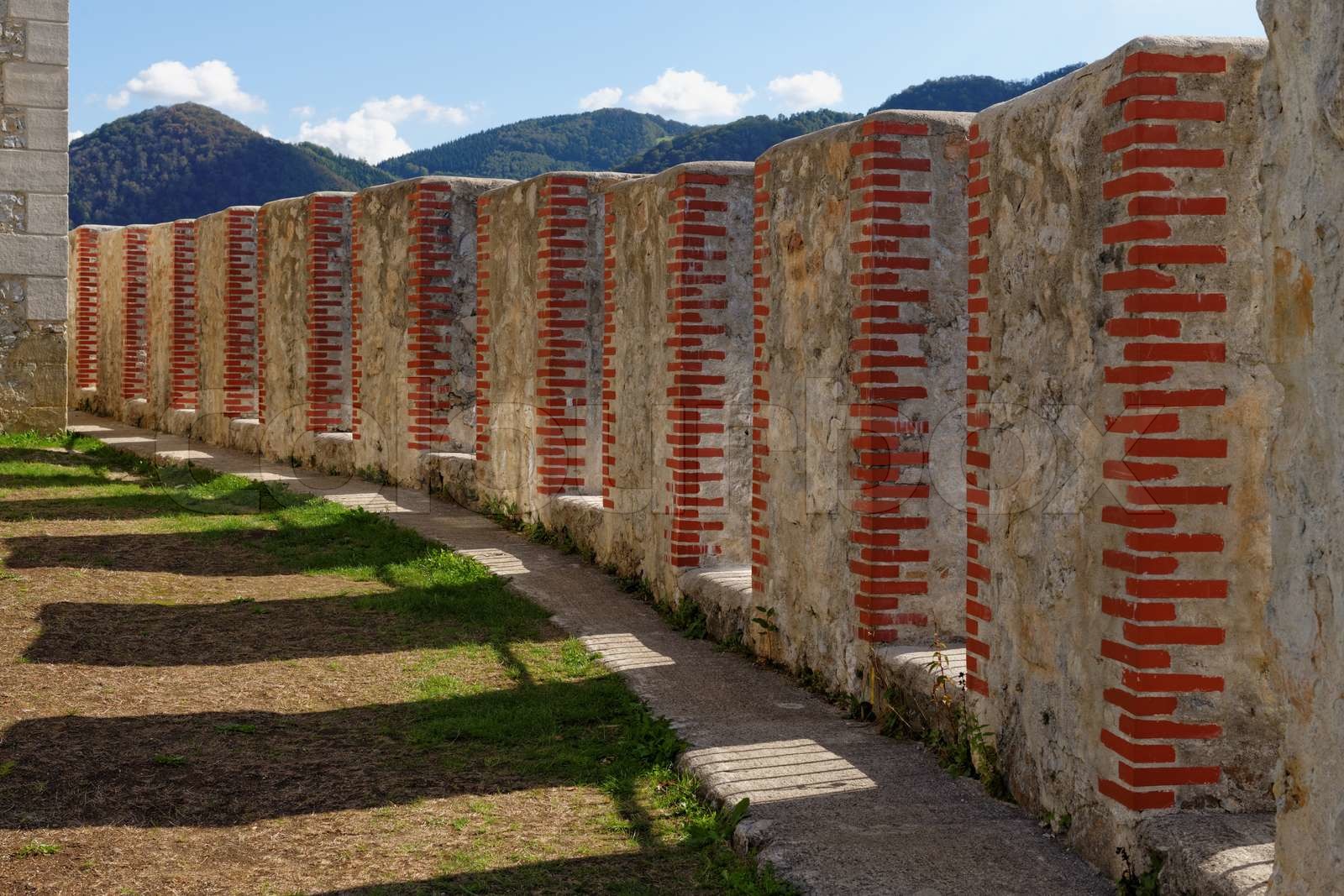 Converging crenellations of Celje medieval castle in Slovenia | Stock ...