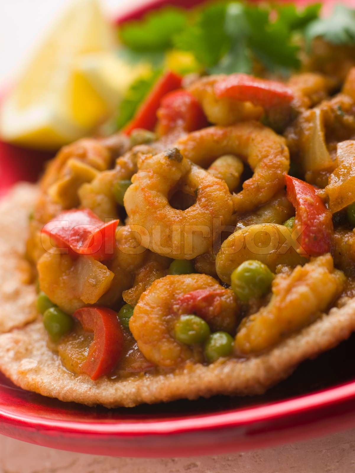 Plate of Prawn Puri with Lemon | Stock image | Colourbox