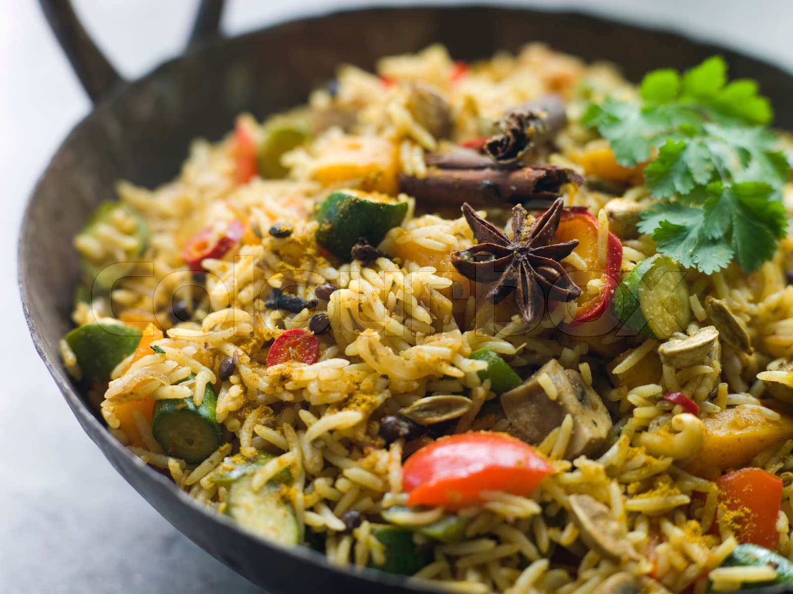 Vegetable Biryani in a Large Karahi pan | Stock image | Colourbox