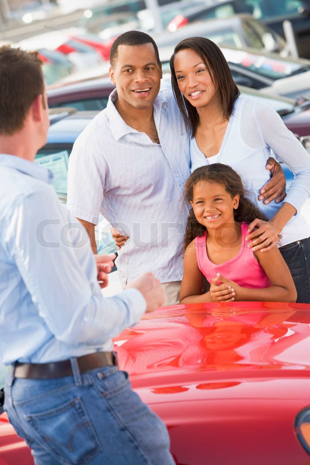 Young Family Collecting New Car From Salesman Stock Image Colourbox young-family-collecting-new-car-from-salesman-stock-image-colourbox