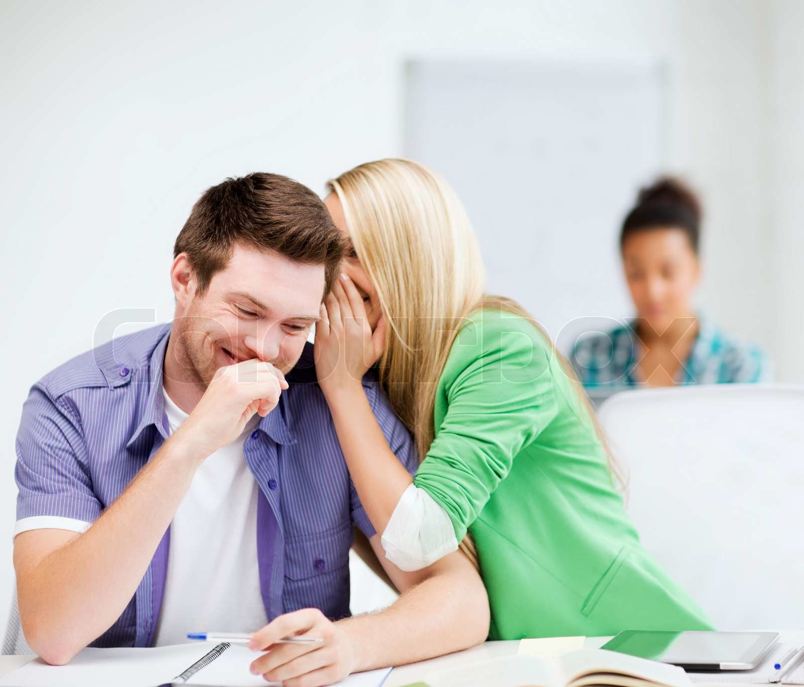 group of students gossiping at school | Stock image | Colourbox