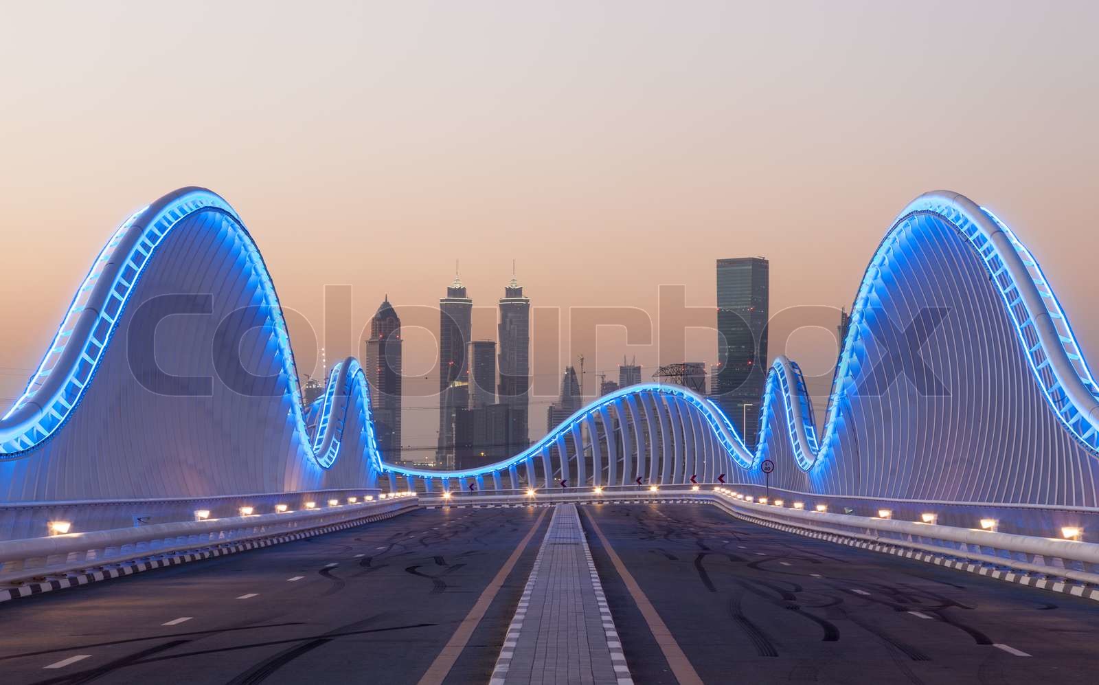 Meydan Bridge illuminated at night, Dubai, United Arab Emirates | Stock ...