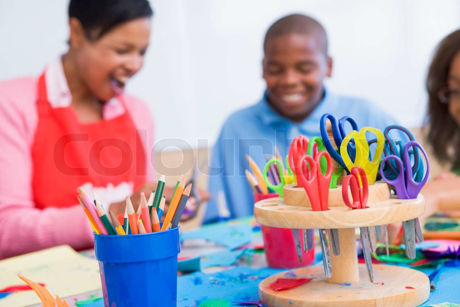 Elementary school art class with teacher | Stock image | Colourbox