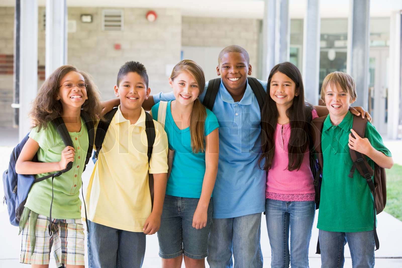 Elementary school class standing outside | Stock image | Colourbox
