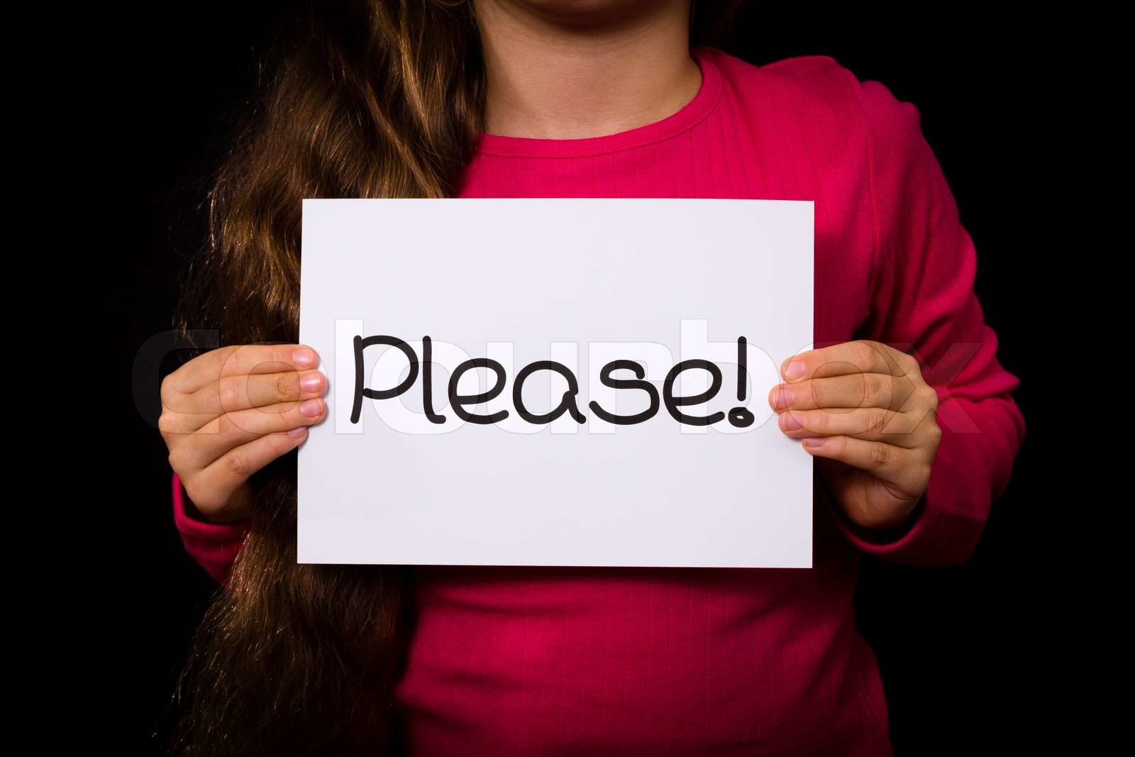 Child holding Please sign | Stock image | Colourbox