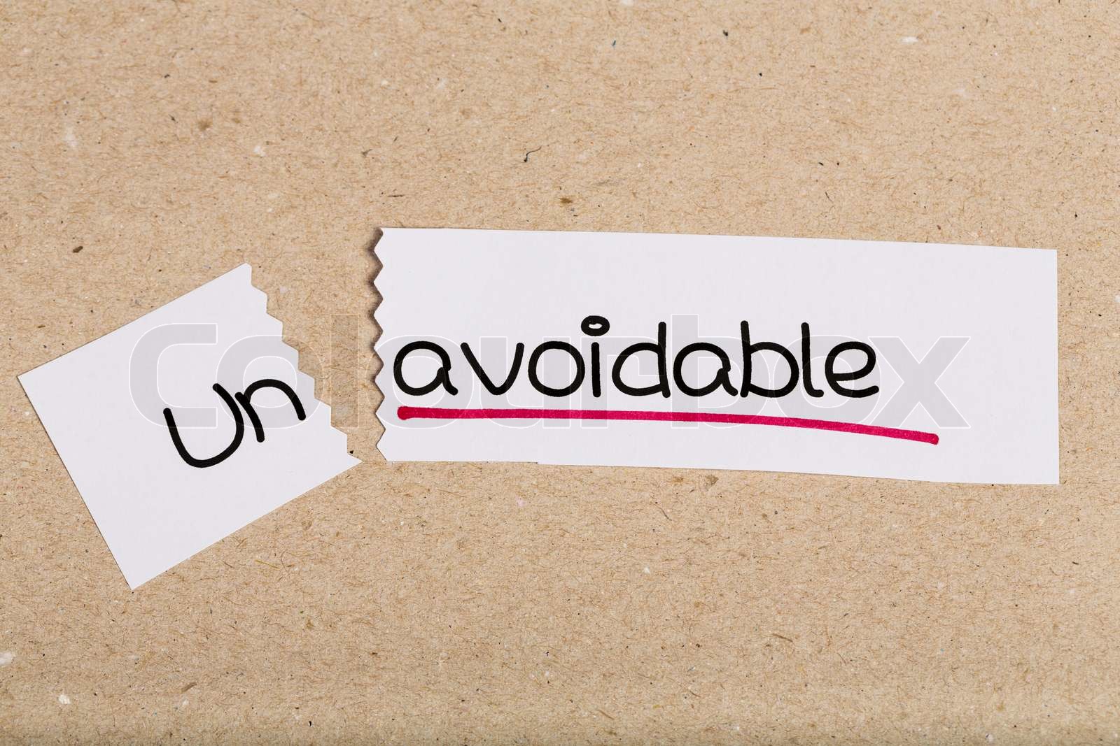 Sign with word unavoidable turned into avoidable | Stock image | Colourbox