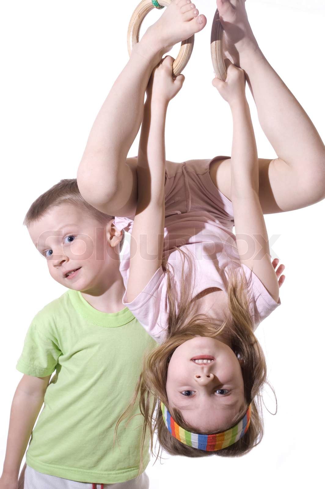 two kids playing with gymnastic rings | Stock image | Colourbox
