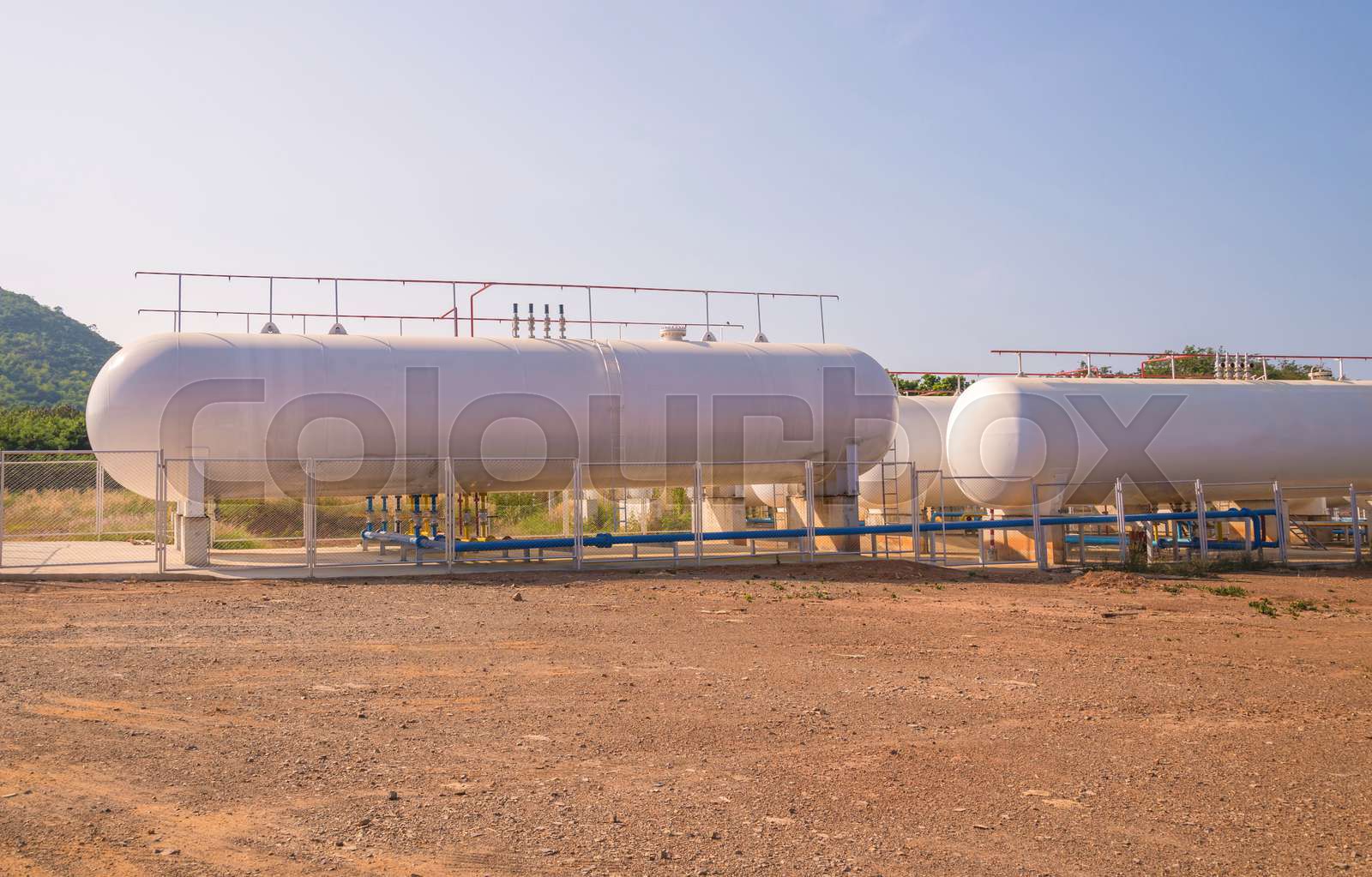Natural Gas storage tanks in industrial plant. | Stock image | Colourbox