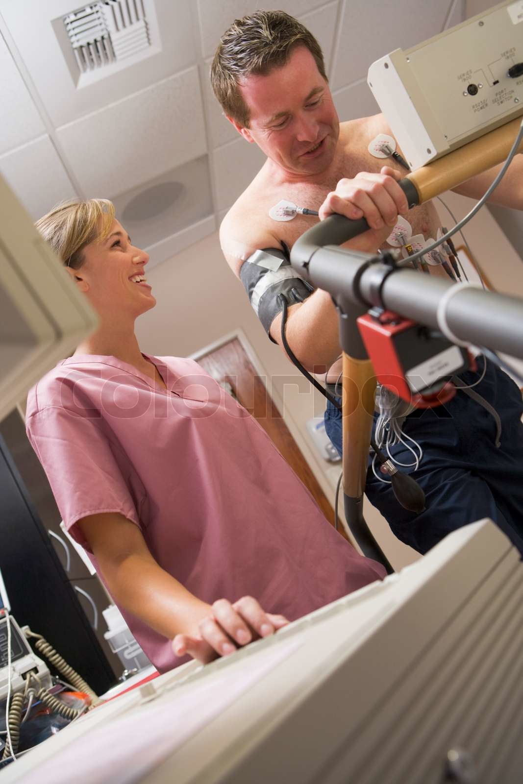 Nurse With Patient During Health Check | Stock image | Colourbox