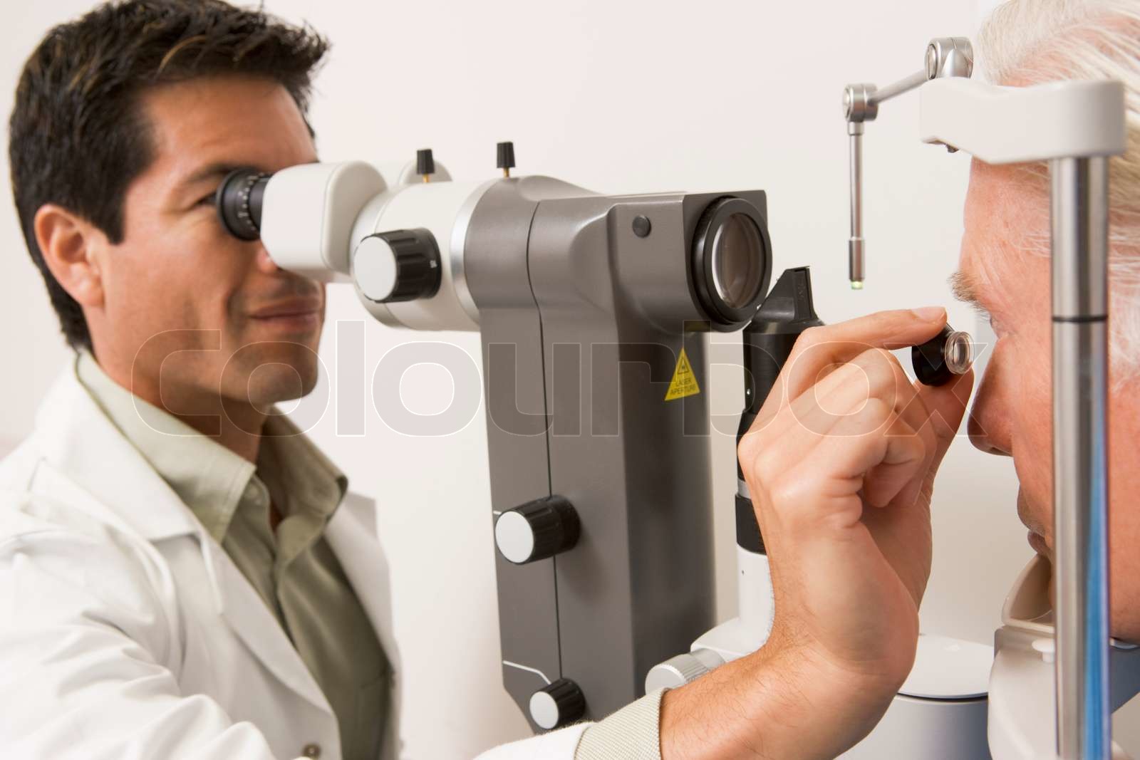 Doctor Checking Patient's Eyes | Stock image | Colourbox