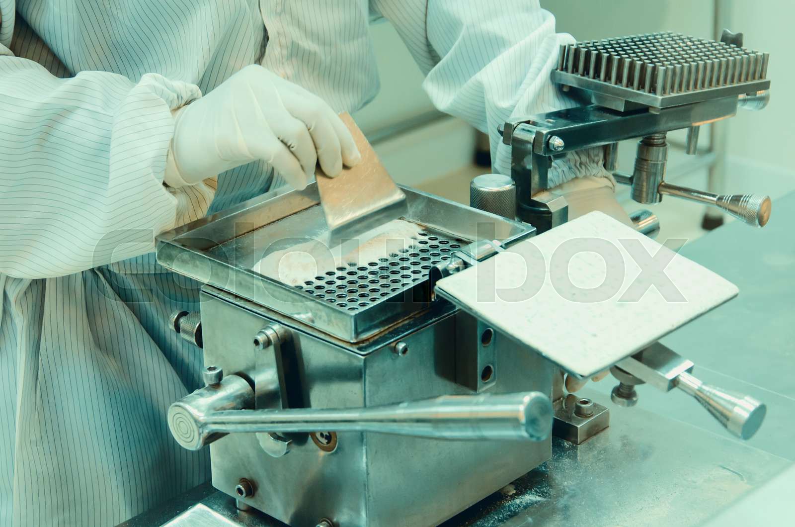pharmacist preparing medication with packaging capsule | Stock image ...