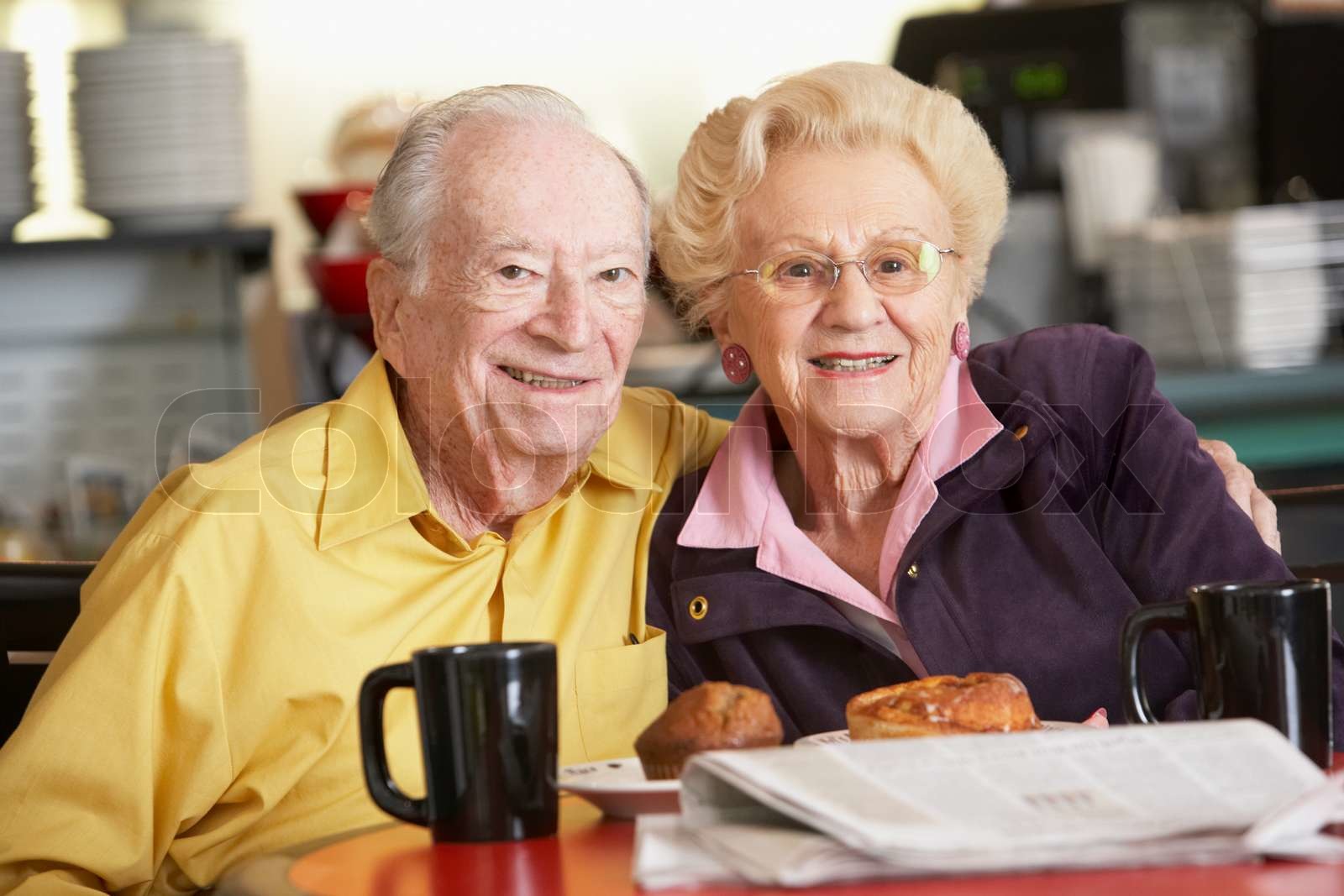 Senior couple having morning tea together | Stock image | Colourbox