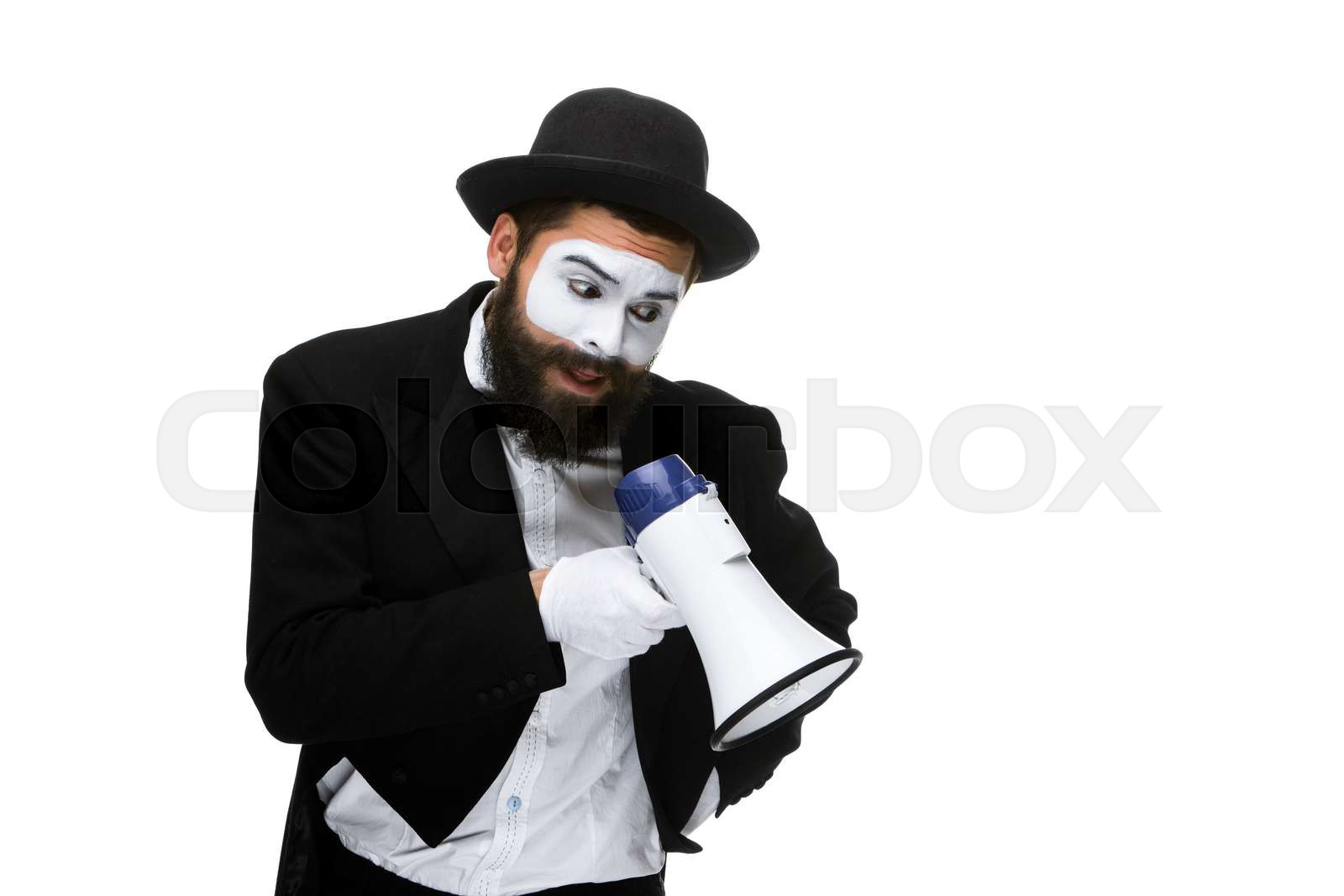 Man with a face mime screaming into megaphone | Stock image | Colourbox