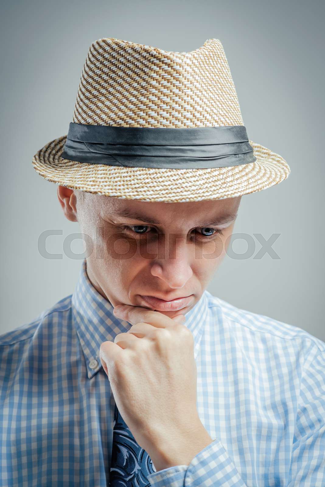 man in hat thinking | Stock image | Colourbox