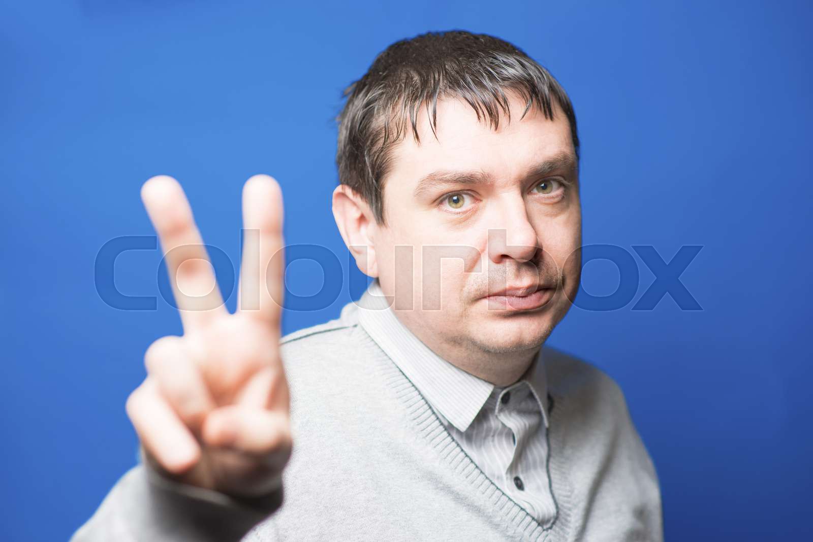 Portrait of a Man hand sign | Stock image | Colourbox