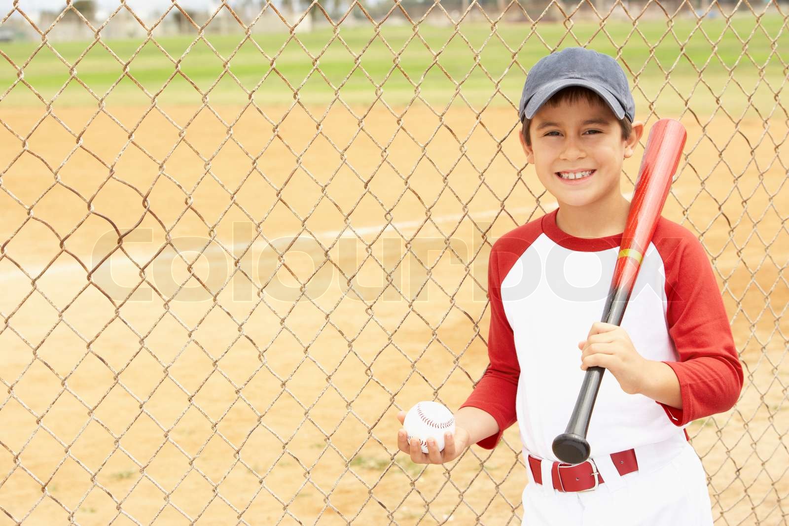Young Boy Playing Baseball | Stock image | Colourbox