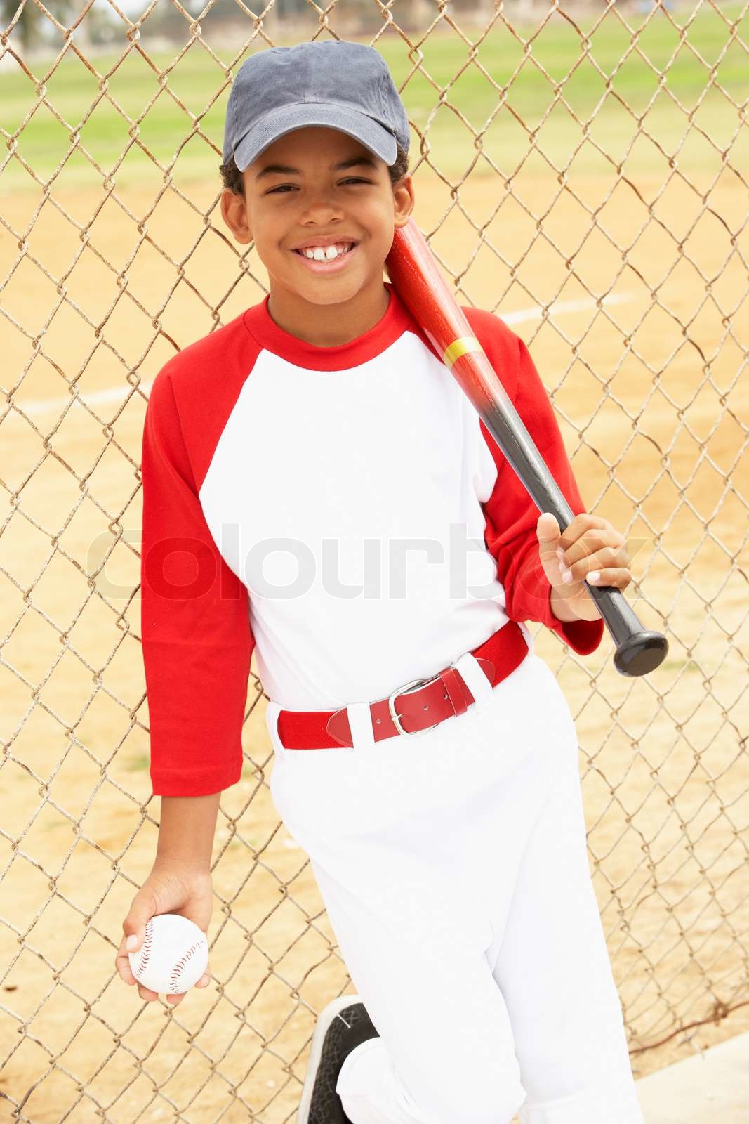 Young Boy Playing Baseball | Stock image | Colourbox