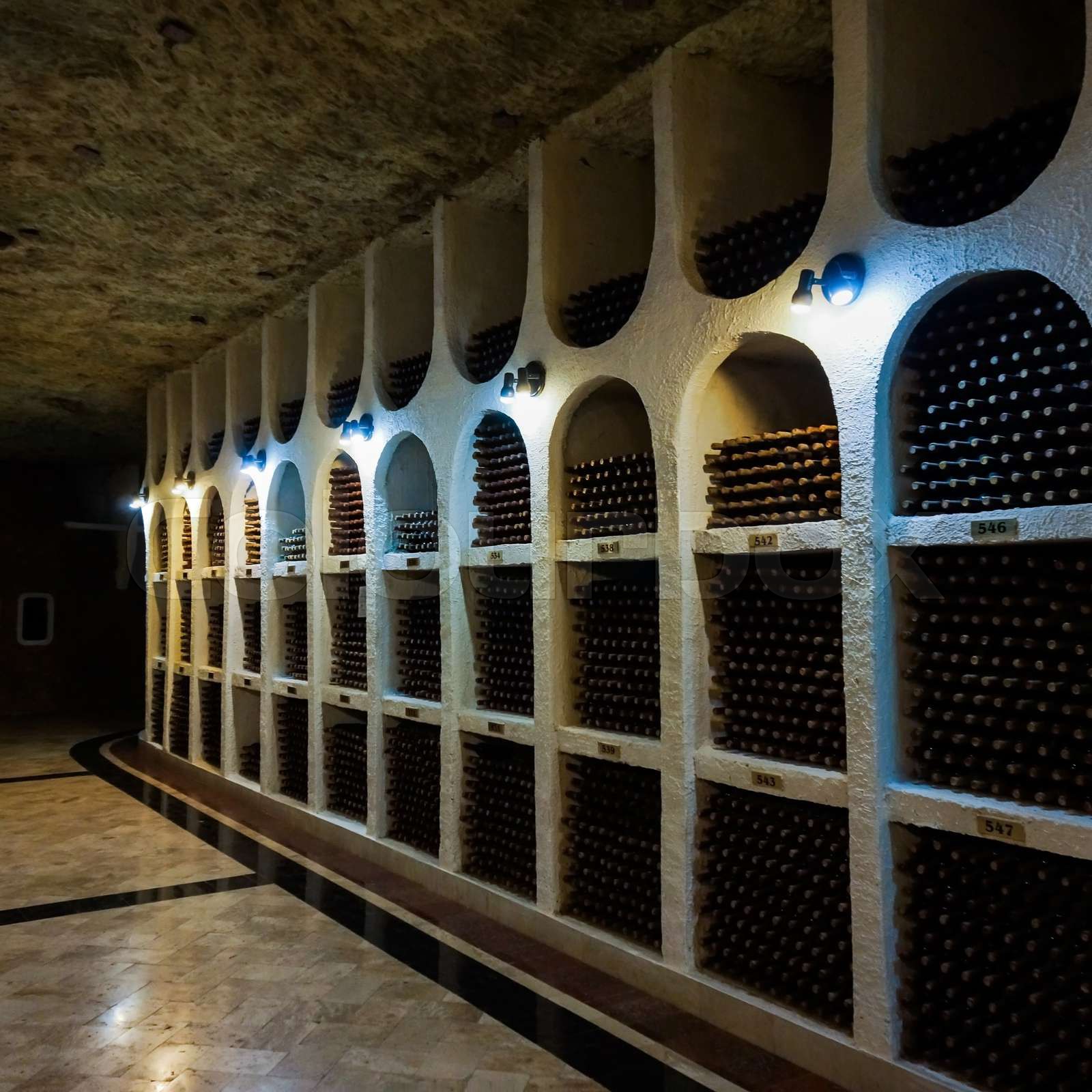 wine bottles in wine cellar | Stock image | Colourbox