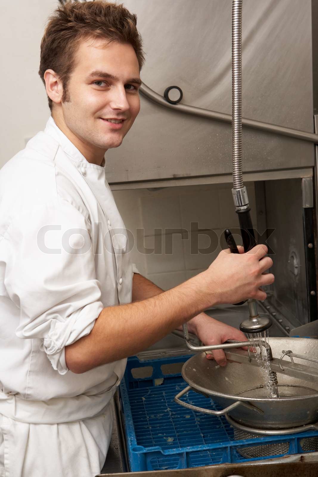Kitchen Worker Washing Up In Restaurant Kitchen | Stock image | Colourbox