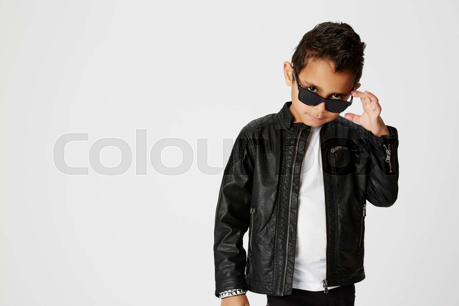 Cool young boy posing | Stock image | Colourbox