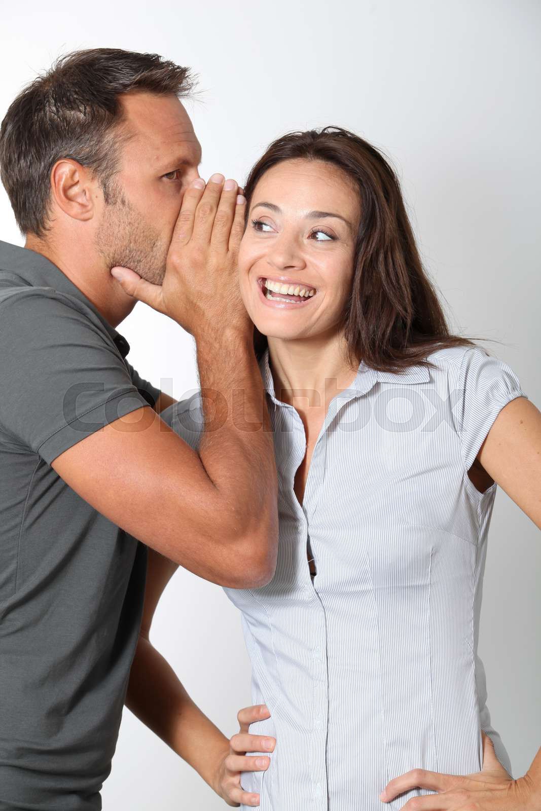 Telling a secret | Stock image | Colourbox