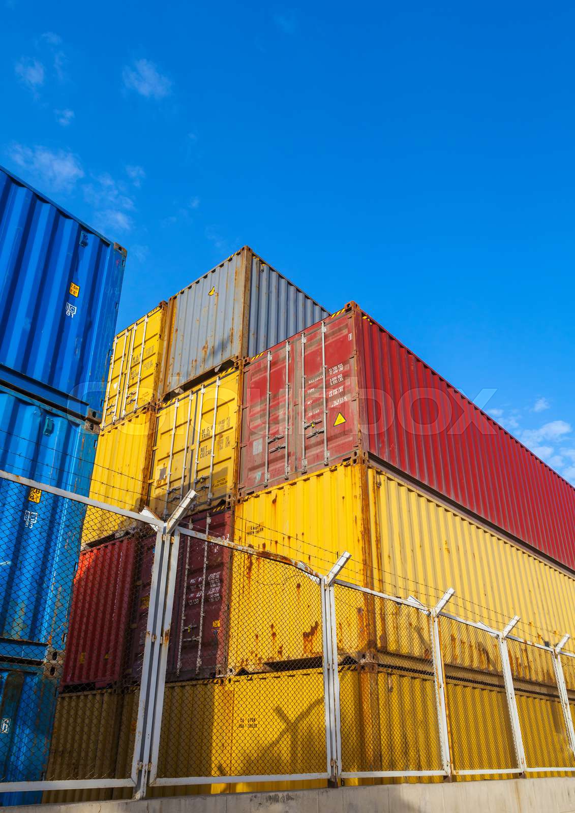 Colorful Industrial cargo containers. Vertical photo | Stock image ...