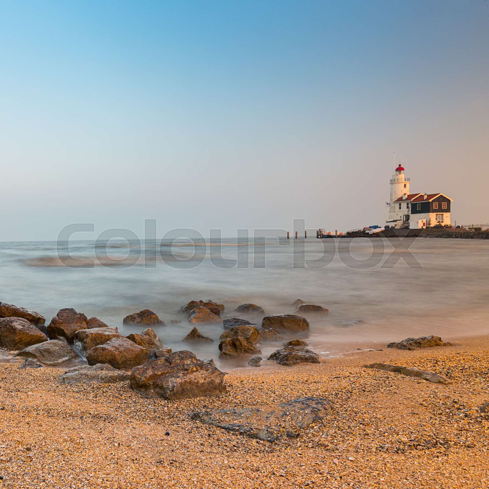 Lighthouse at the beach | Stock image | Colourbox