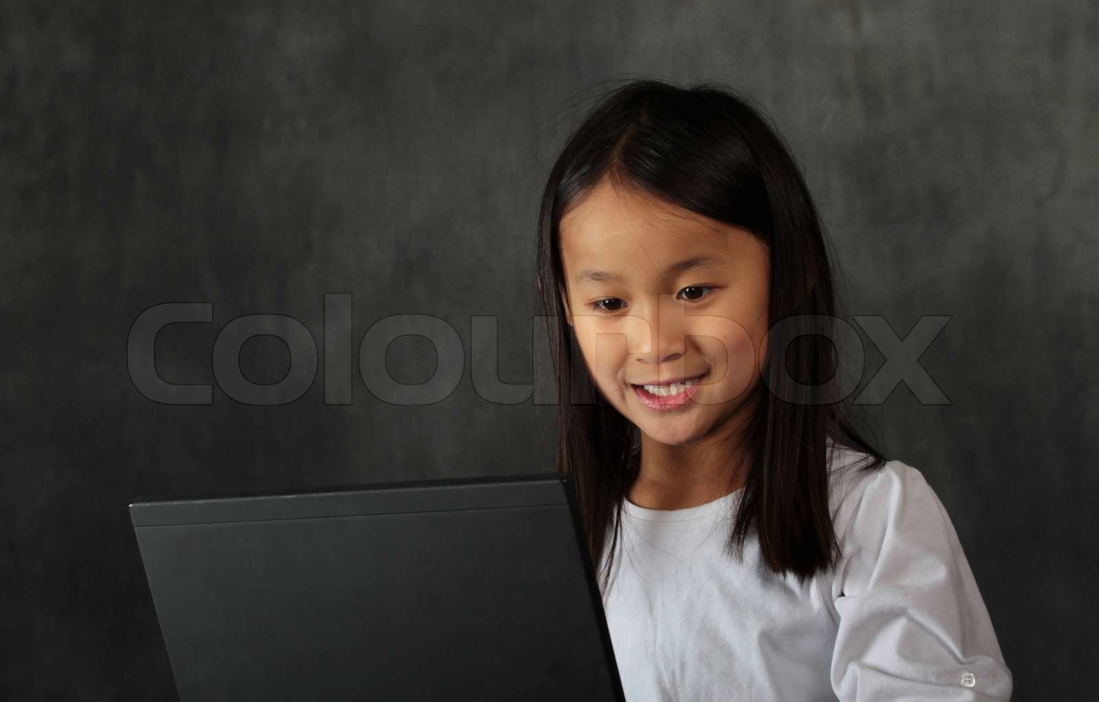 girl and computer | Stock image | Colourbox