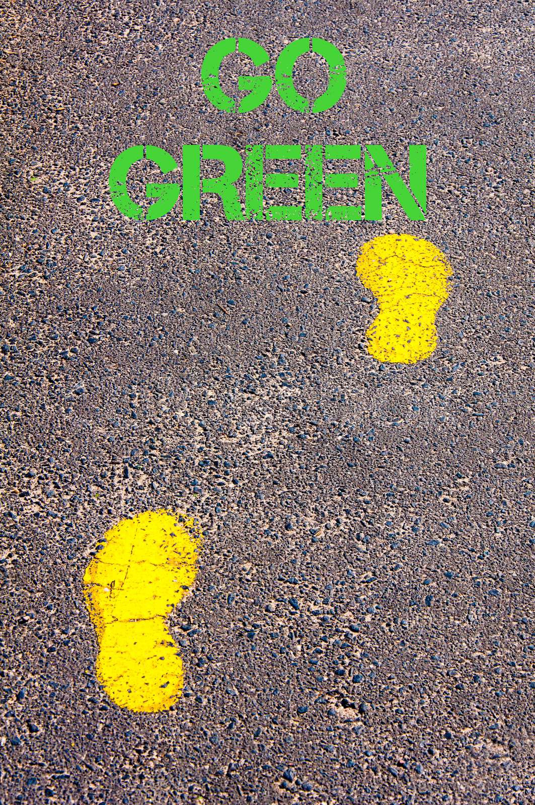 Yellow footsteps on sidewalk towards Go Green message | Stock image ...